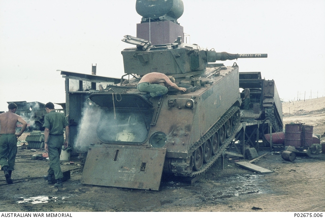 With steam coming from the engine compartment, this M113A1 Fire Support ...