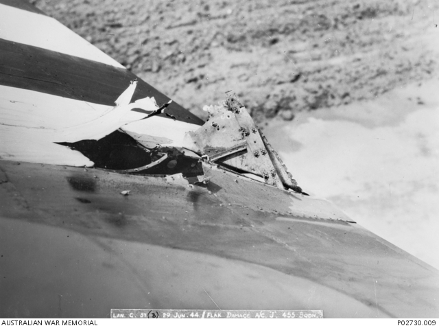 View of serious damage to the starboard wing of a 455 Squadron, RAAF ...