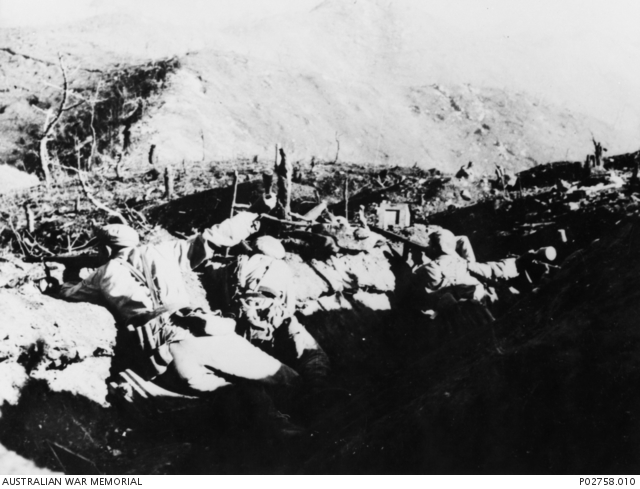 Korea. 14 October 1952. Chinese Army soldiers entrenched on the rise of ...