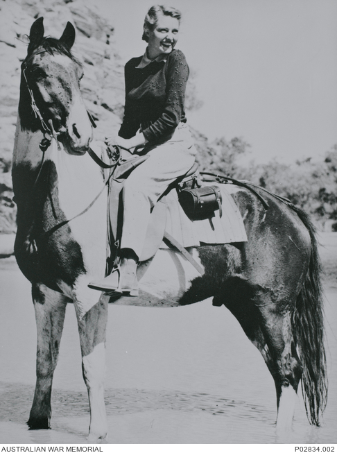 Roper River, NT. c. 24 August 1945. Portrait of Daphne Campbell astride ...