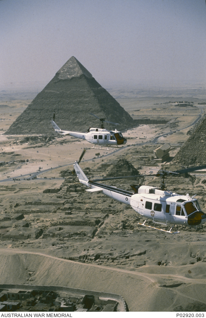 Gizeh, Egypt. 14 March 1986. Two UH-1H Iroquois helicopters, one RAAF ...