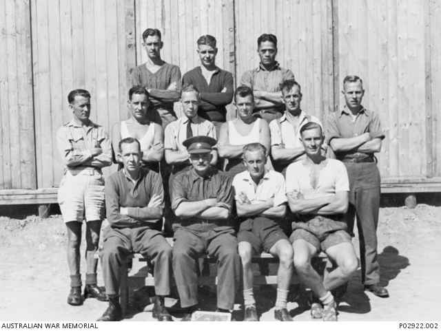 Group portrait of allied prisoners of war (POWs) who shared a hut in ...