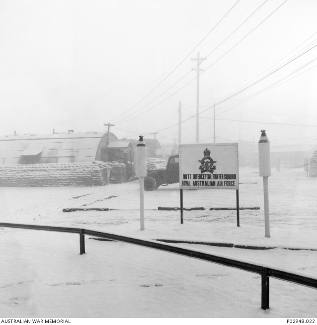 Entrance to the 77 Squadron RAAF base. The sign in the foreground ...