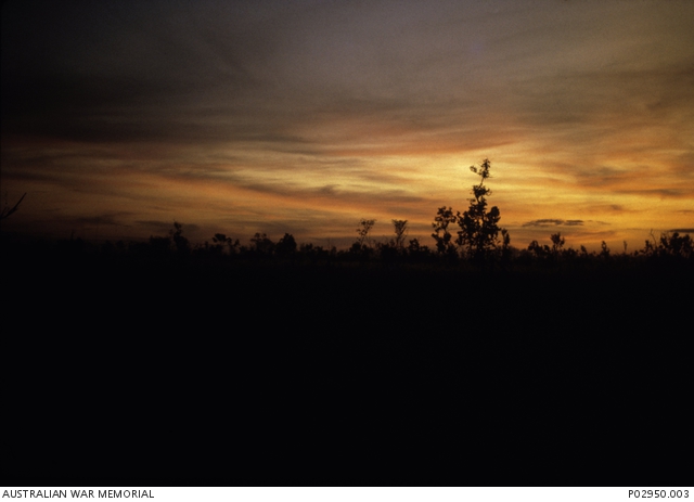 A view of the dawn skies over Fire Support Base (FSB) Coral after the ...