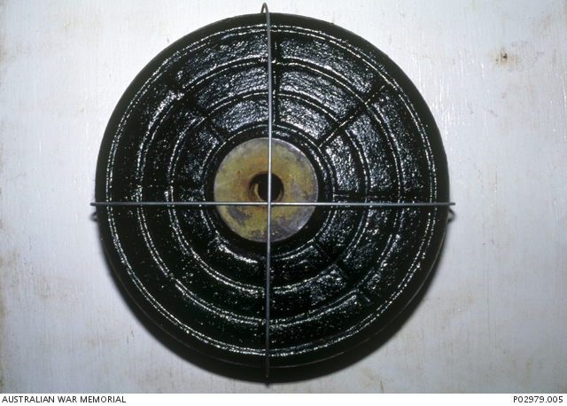 An unidentified fragmentation mine, as used by the Viet Cong during the ...