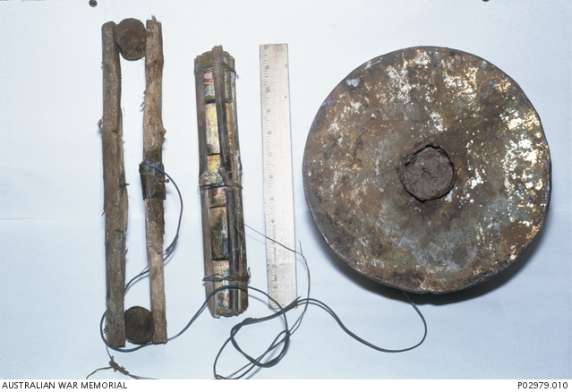 An example of a recovered shaped charge mine that had been placed by ...