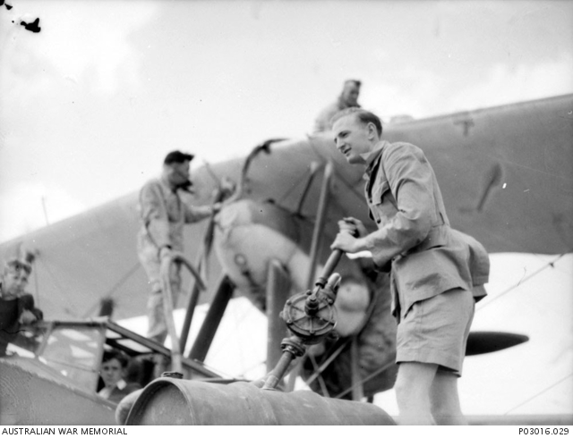 NSW. January 1943. RAAF photographer 25723 W. H. (Bill) Robinson using ...