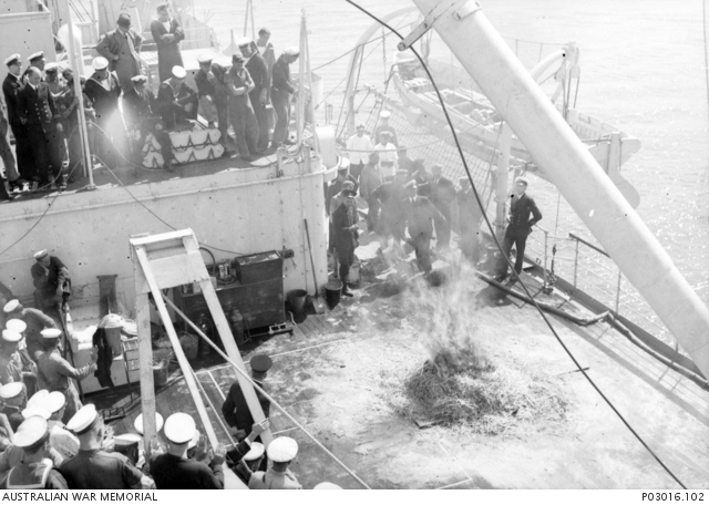 Members of the NSW Fire Brigade demonstrating to the crew of the Armed ...