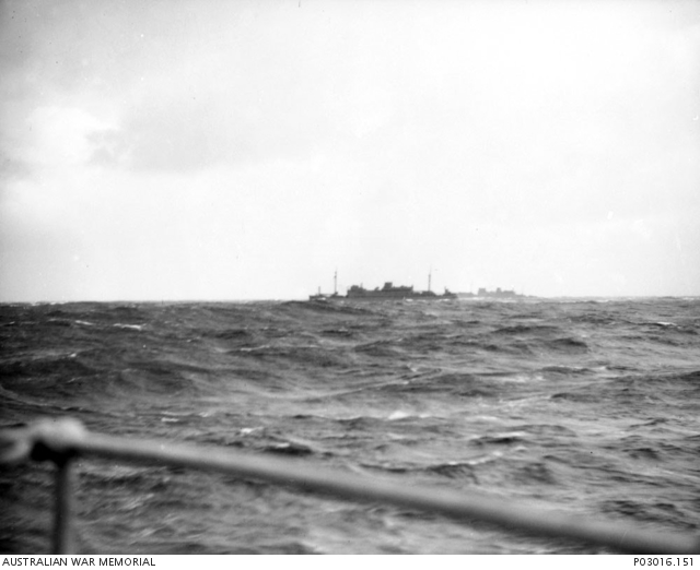 At Sea. July 1942. Three other ships in the convoy seen from the Armed ...