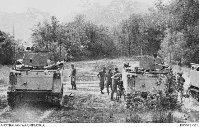 Members of 6 Battalion, The Royal Australian Regiment (6RAR), stand ...