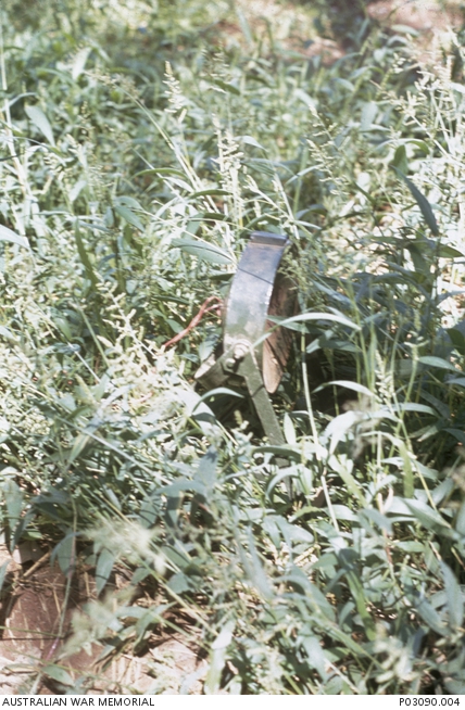 A Chinese Communist (Chicom) Dh10 directional type mine in situ, as ...