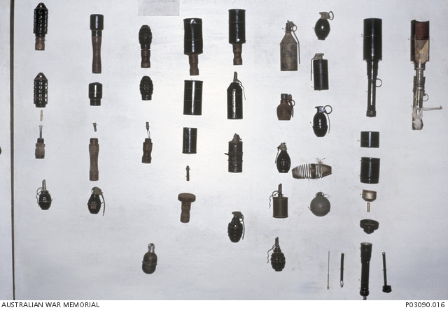 A display board showing a range of captured Viet Cong and North ...