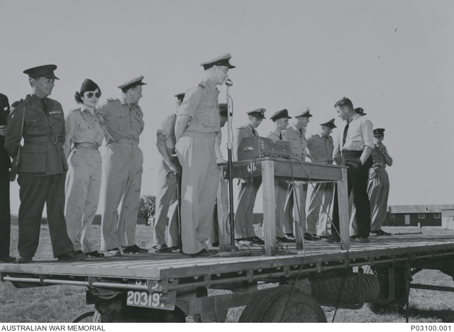 An improvised stage at an airfield (possibly in Queensland) where a ...