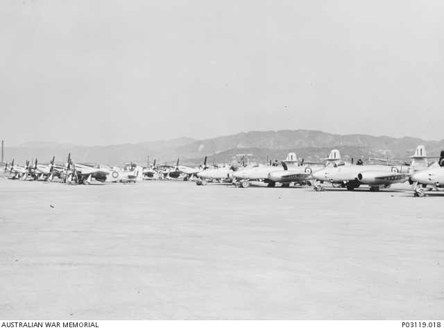 Aircraft of 77 Squadron RAAF line the air strip in Japan. They are P ...