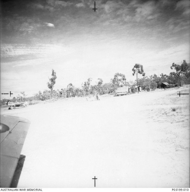 A view of the road from the Bohle River airstrip to the tent lines with ...
