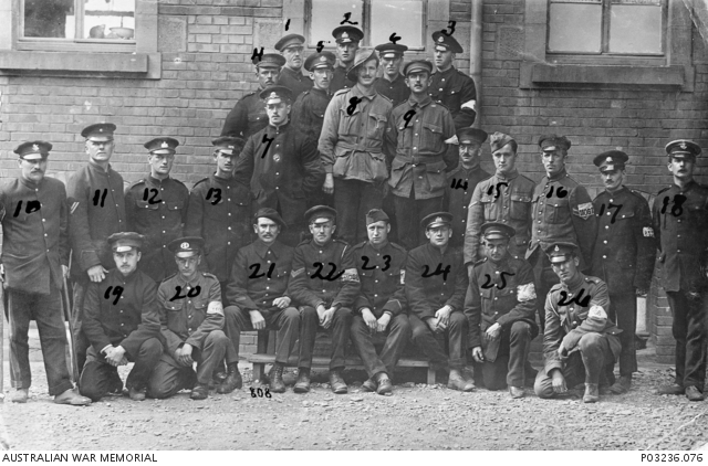 Outdoor portrait of a group of Prisoners of War (POW) at Stuttgart 2 ...