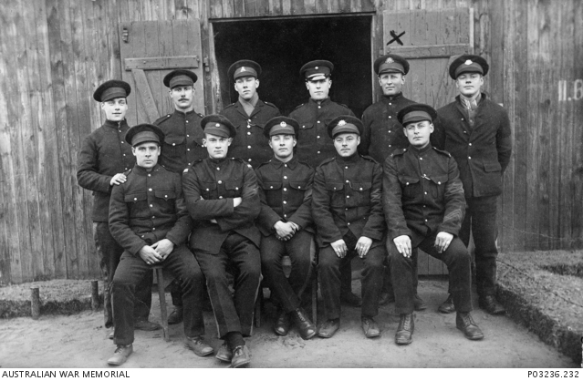 Outdoor portrait of a group of allied Prisoners of War (POW) at a POW ...
