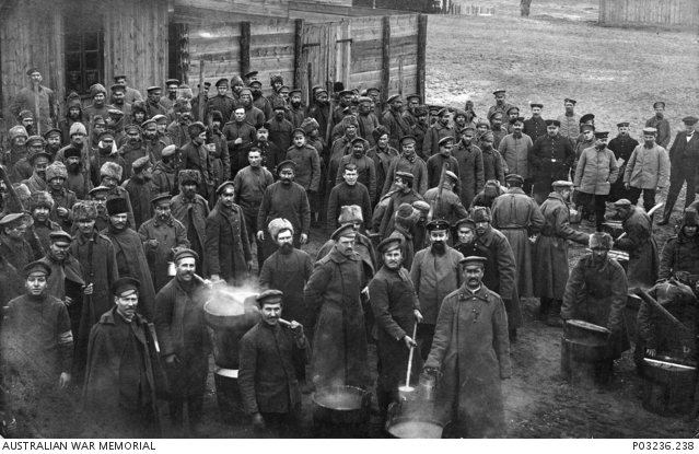 Outdoor portrait of a group of allied Prisoners of War (POW) at an ...