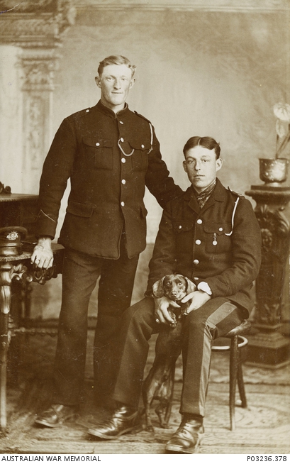 Studio portrait of two allied Prisoners of War (POW), the soldier ...