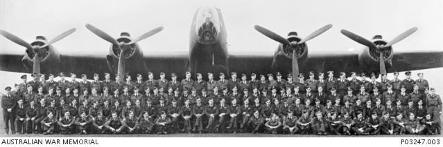 Group portrait of members of 466 (Halifax) Squadron RAAF in front of a ...