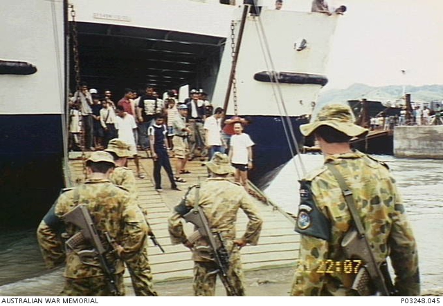 Dili, East Timor. 20 December 1999. Four Australian soldiers, including ...