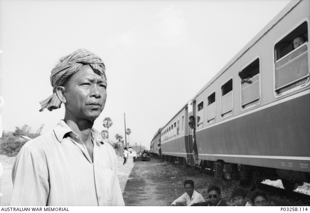 A Cambodian Red Cross worker surveys the arriving 'Sisophon Express ...