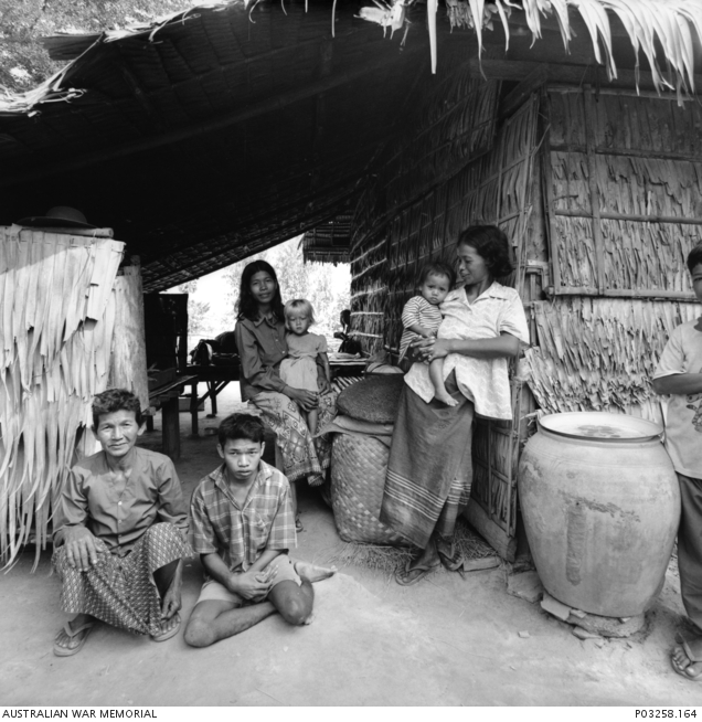 Widow Chhoeung Yann (left) with four of her seven children and one of ...