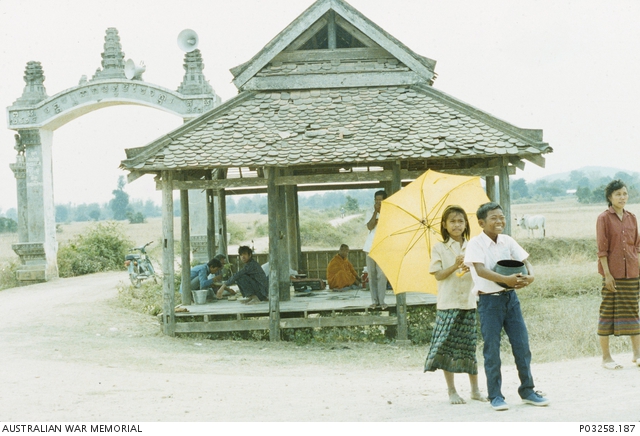 At a village gate on the road from Battambang to Sisophon, Cambodian ...