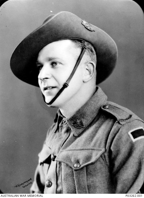 Studio portrait of QX19300 Private (Pte) Walter (Wally) Woolard, 2/2nd ...