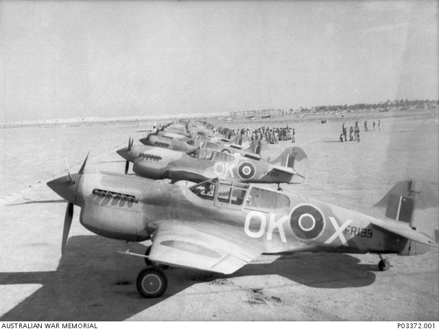 Aircraft of 450 (Kittyhawk) Squadron RAAF, serial OK-X (front), lined ...