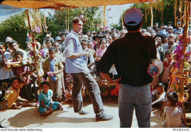 Members of the United Nations Mission East Timor (UNAMET) standing in ...