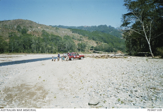 East Timorese children and an unidentified members of the United ...
