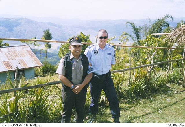 Informal portrait of New Zealand Police Constable Rob Mills (right), a ...