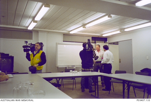 Commander Ray Sutton, New Zealand Police, talking to the media ...