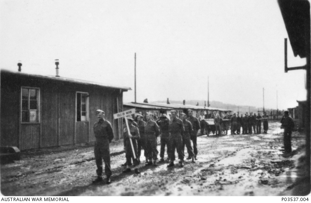 Australian soldiers marching through Stalag II during an Anzac Day ...