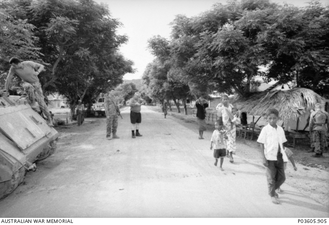 At a road block on the way to Batugade, two unidentified Australian ...