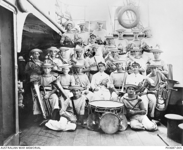 Group portrait of the members of HMAS Pioneer's brass band. The seamen ...