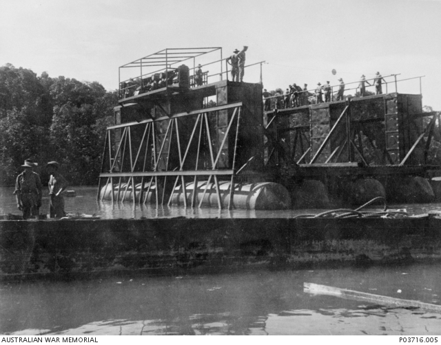 Unidentified Australian Soldiers stand on top of the newly completed ...