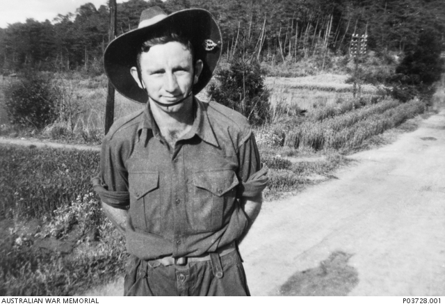 Informal portrait of 2/7934 Private (Pte) J B 'Bernie' Phillpot. Pte ...