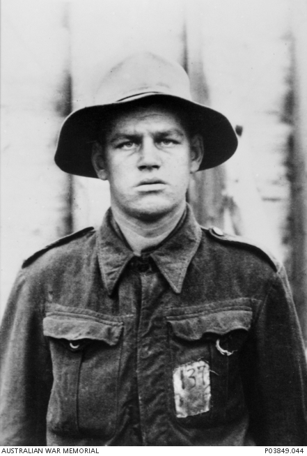 Informal portrait of NX54141 Private (Pte) James William Downie, a ...