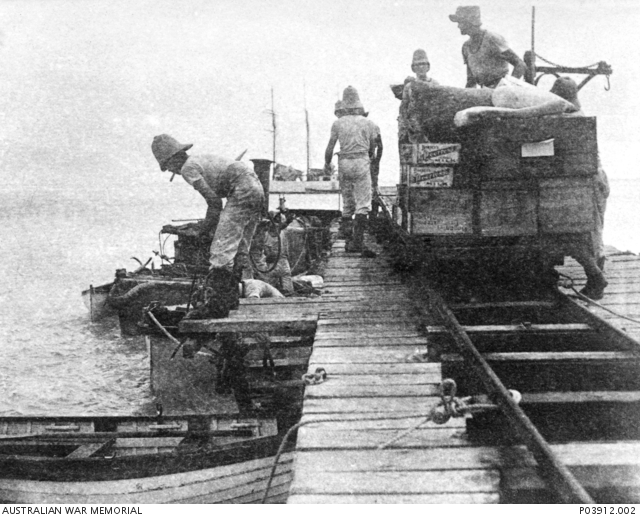 A German landing party at Direction Island, preparing to go aboard the ...