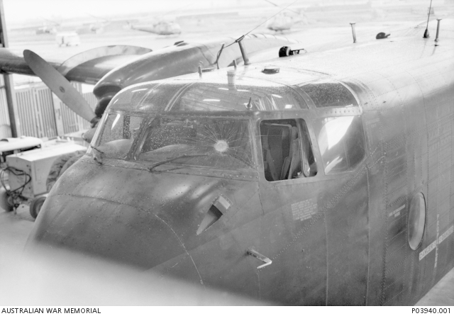 The windscreen of a No 35 Squadron, RAAF Caribou aircraft, showing a ...