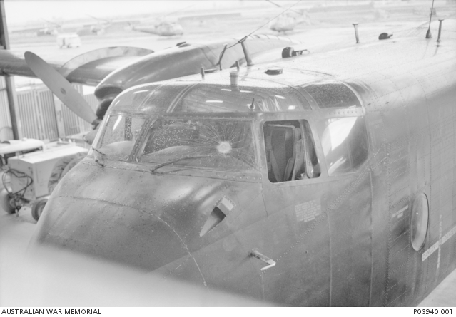The windscreen of a No 35 Squadron, RAAF Caribou aircraft, showing a ...
