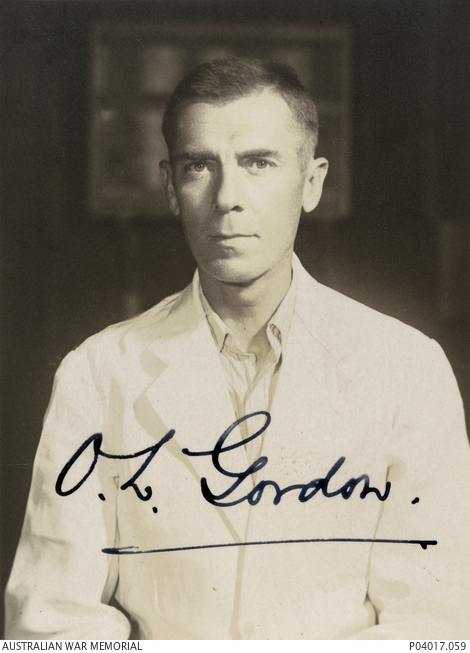 Portrait of Captain (Capt) Oliver L Gordon, Royal Navy (RN), HMS Exeter ...