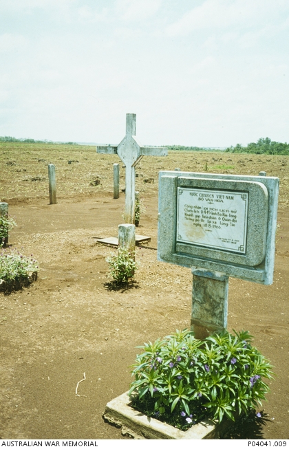 The Long Tan Memorial (left) and a memorial plaque to the D445 ...