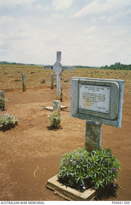 The Long Tan Memorial (left) and a memorial plaque to the D445 ...