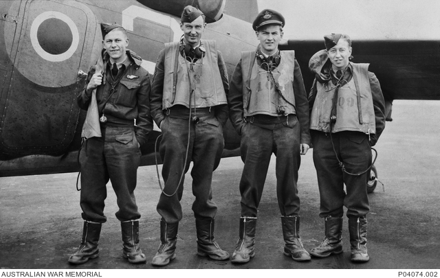 Group photograph of four RAF airman, who have just returned from a ...