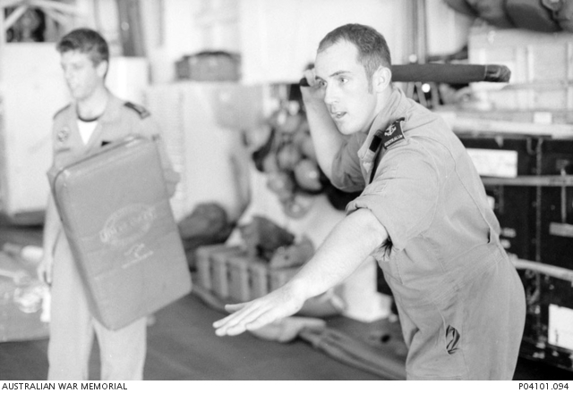Leading Seaman Cory Kaleta (right), conducts a boarding party drill on ...