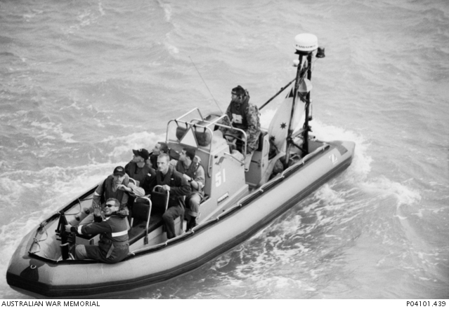 A boarding party leaves HMAS Kanimbla in a Rigid-Hulled Inflatable Boat ...