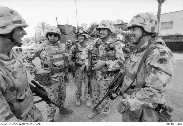 Informal group portrait of, left to right: Air Commodore (Air Cdre ...